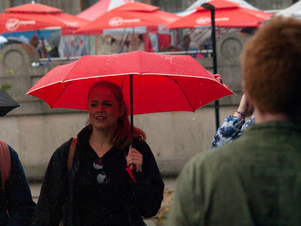 Edward Draper - "Faces and Colour in the Rain" | LensCulture