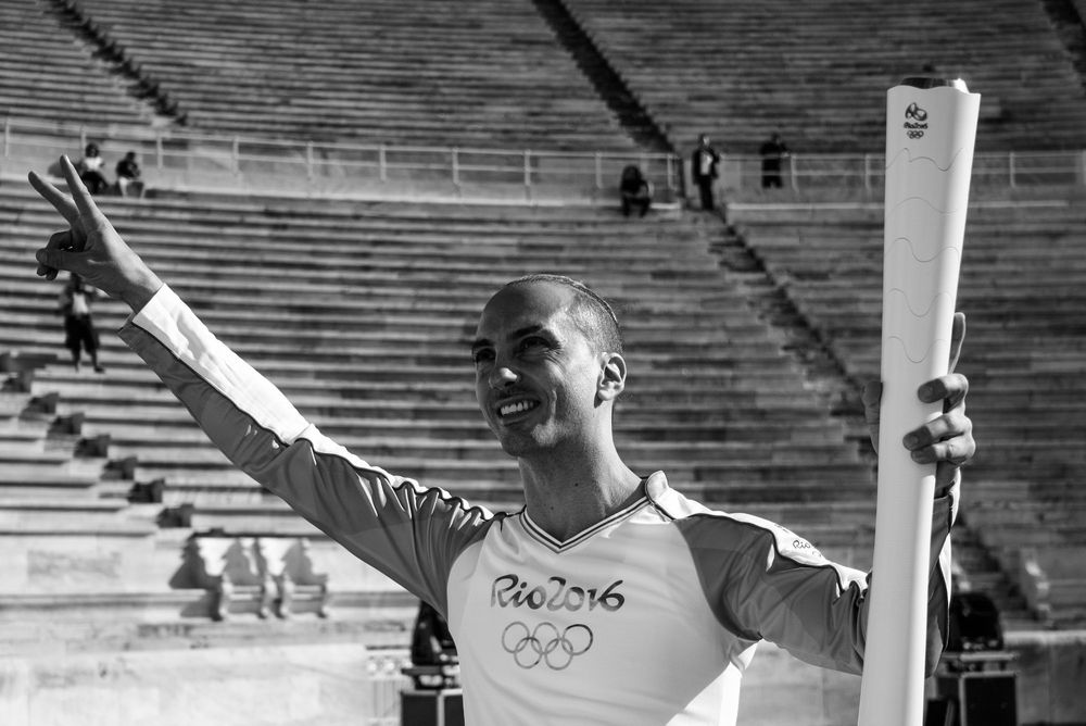 Aris Vedertsis - "Summer Olympics torch relay" | LensCulture