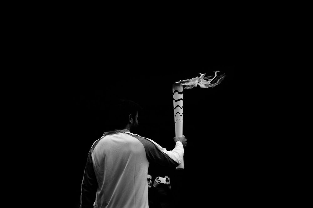 Aris Vedertsis - "Summer Olympics torch relay" | LensCulture