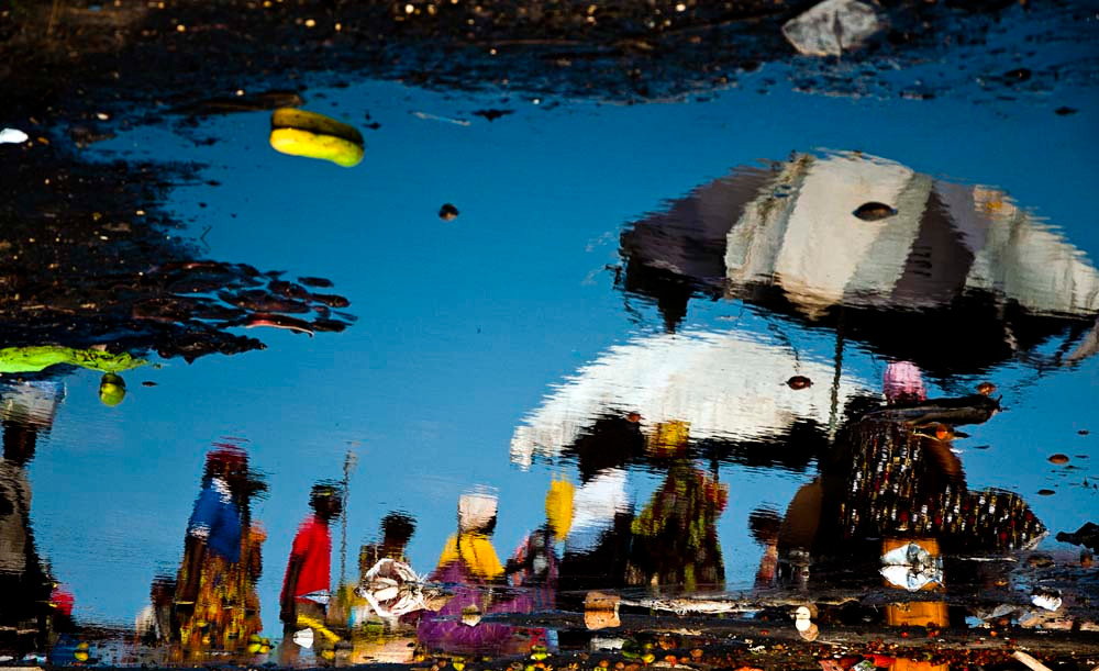 Robert Nzaou - Puddle Hunting | LensCulture