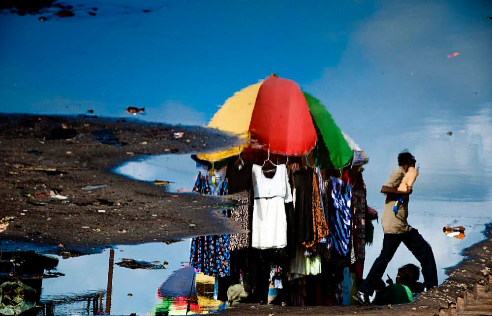 Robert Nzaou - Puddle Hunting | LensCulture