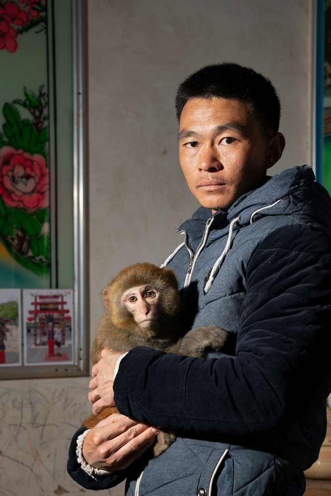 Lihua Han - The portrait of the monkey charmer | LensCulture