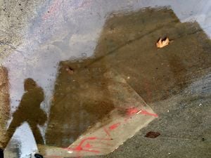 Pierre Hauser - New York Puddle Series | LensCulture